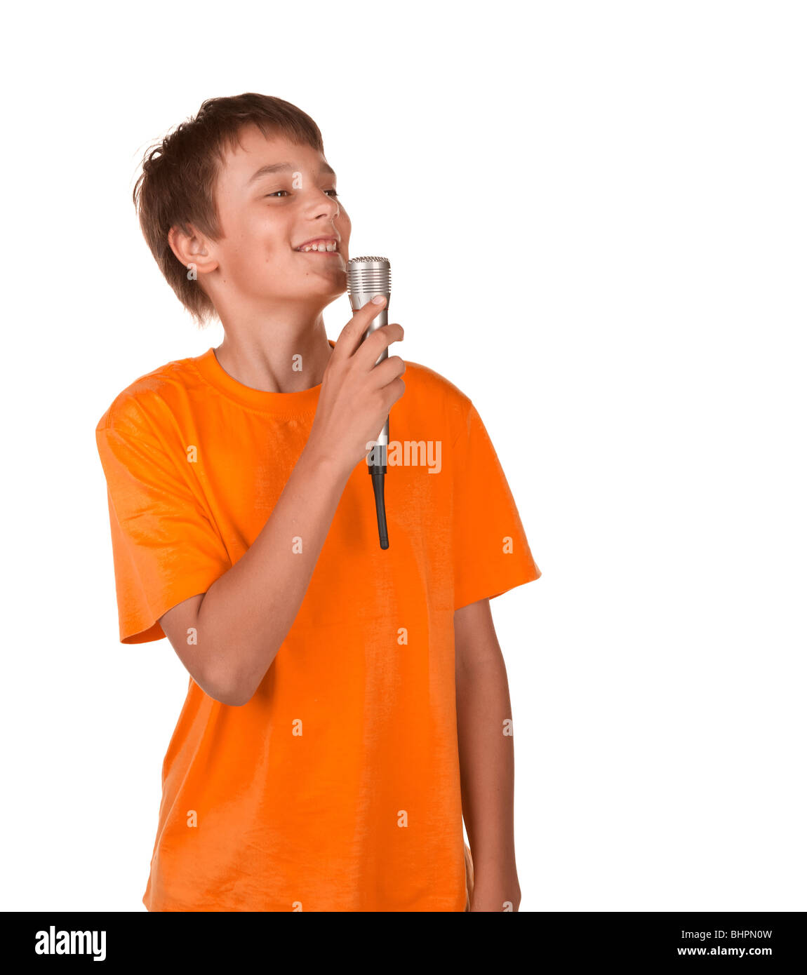 boy singing karaoke isolated on white background Stock Photo - Alamy
