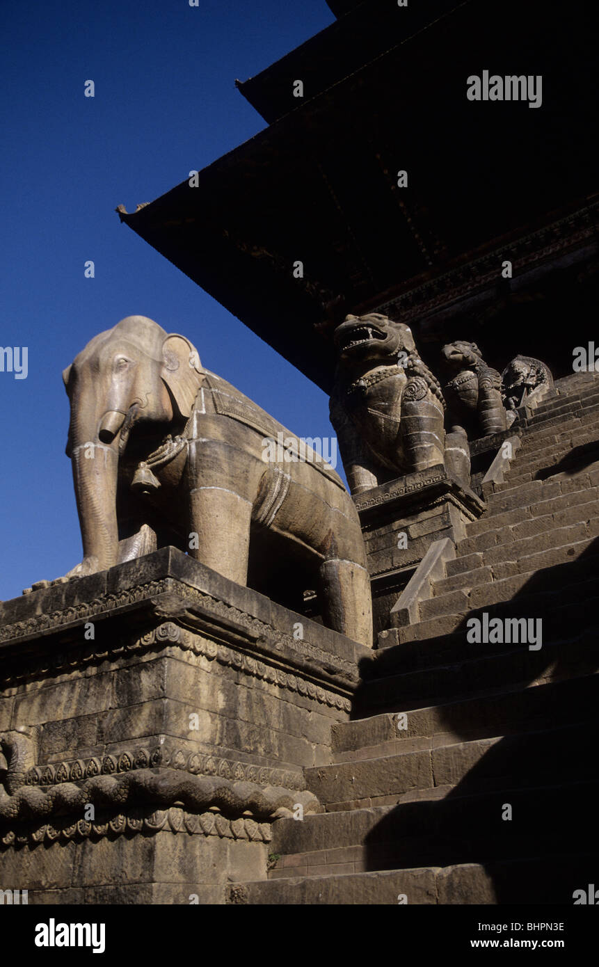 Stone guardian statues on the Hindu Nyatapola temple in Durbar Square ...