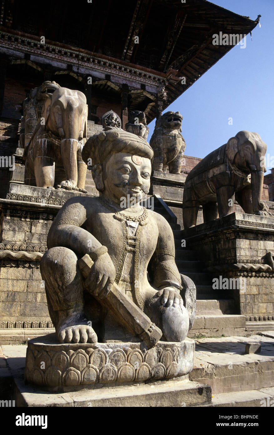Stone guardian statues on the Hindu Nyatapola templein Durbar Square ...