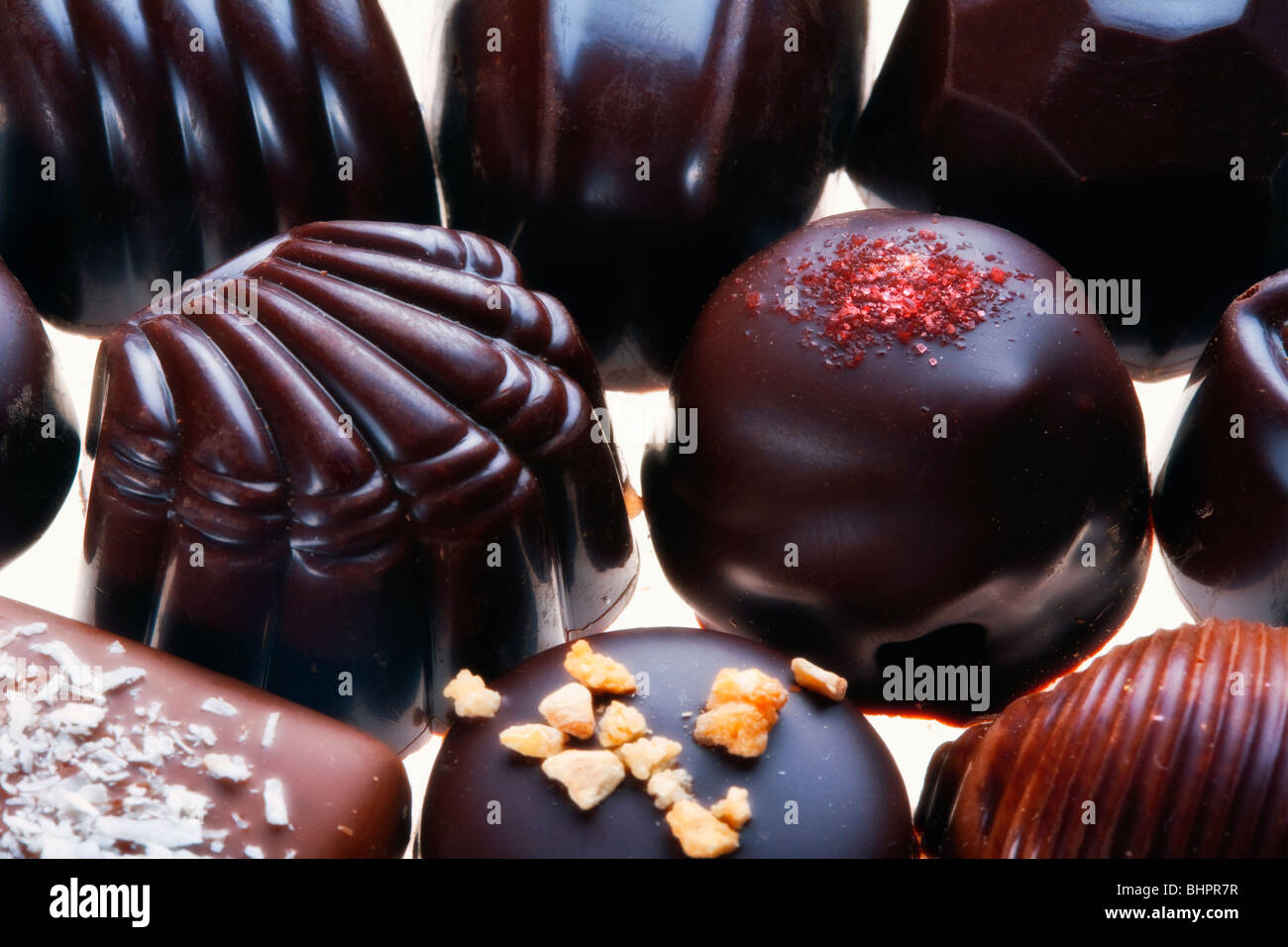 assortment of delicious dark chocolate belgian pralines Stock Photo - Alamy