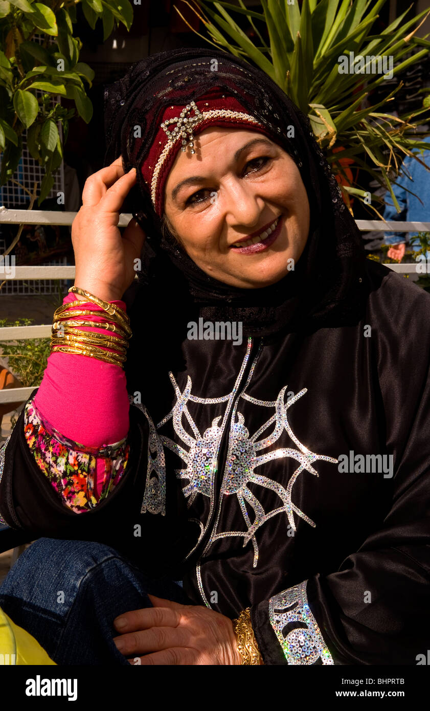 Portrait of Muslim woman with spider dress in Medina shopping area of ...