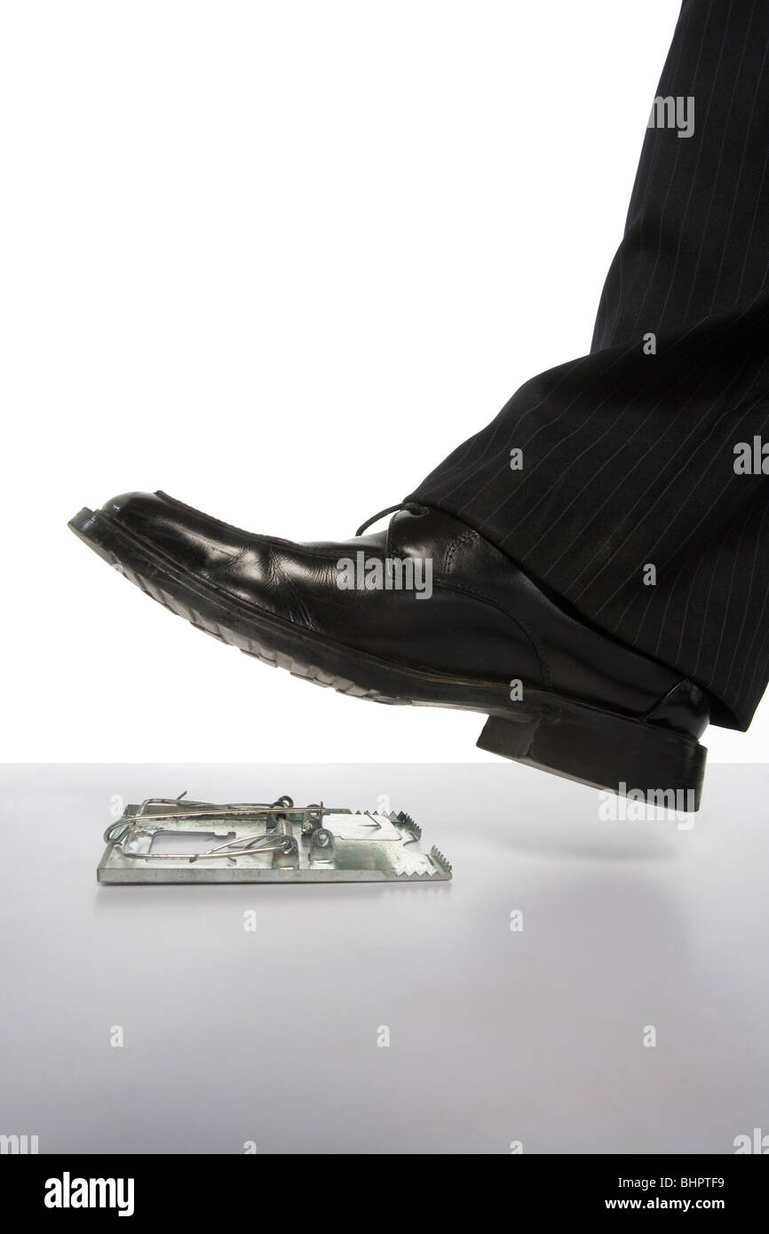 Close-up of foot and mousetrap Stock Photo - Alamy