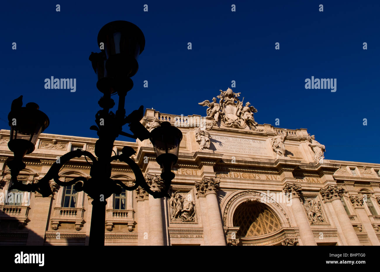 Famous Trevi Fountain with throwing coin tradition in downtown centre ...