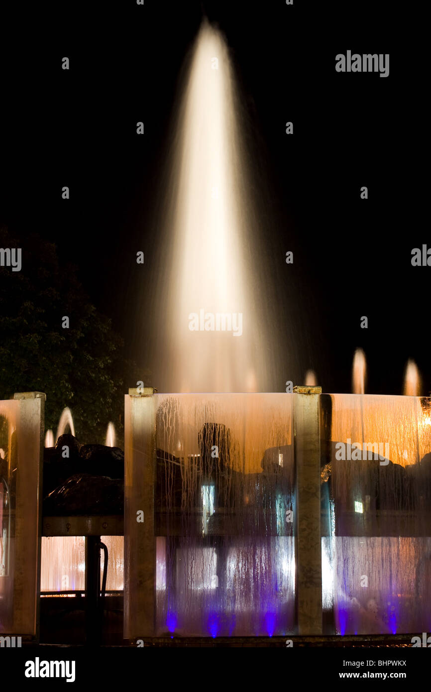 Spring well with lights at night Stock Photo - Alamy