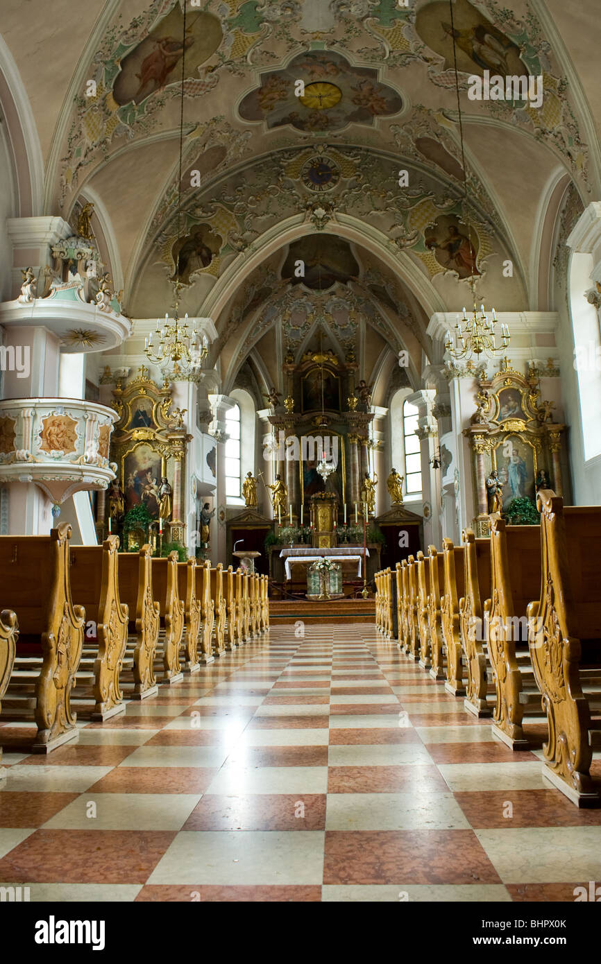 Inside of a church with rows of benches Stock Photo - Alamy