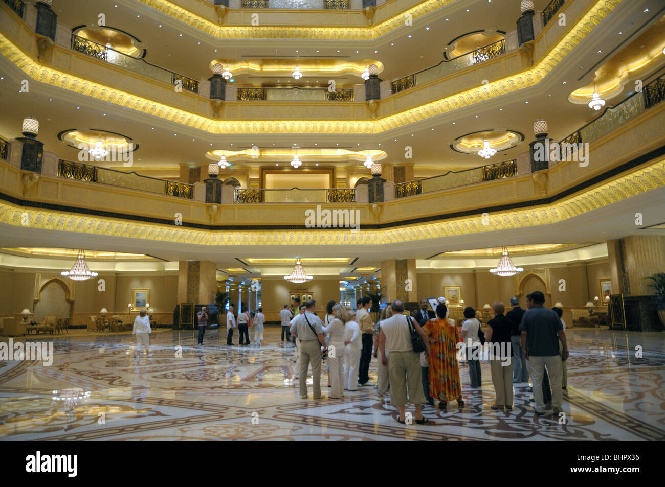 Visitors inside of Emirates Palace, Abu Dhabi United Arab Emirates ...