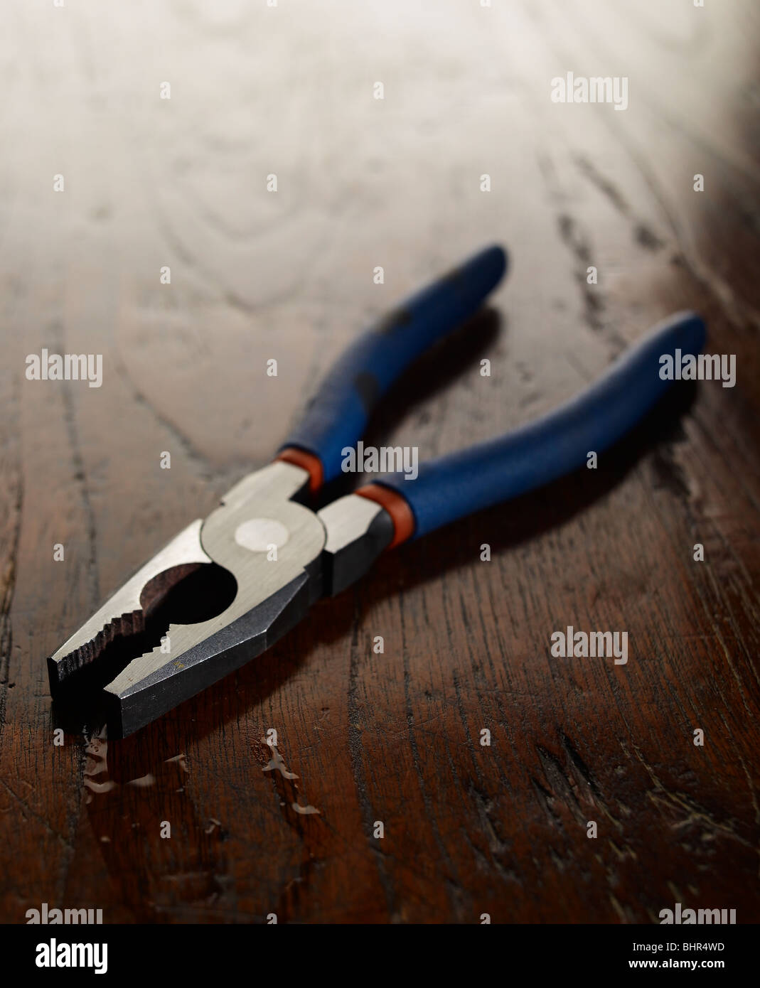 pliers on a table top or floor tool tools work DIY Stock Photo - Alamy