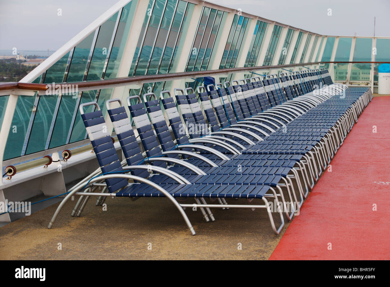 Row of deck chairs on board a cruise ship Stock Photo - Alamy