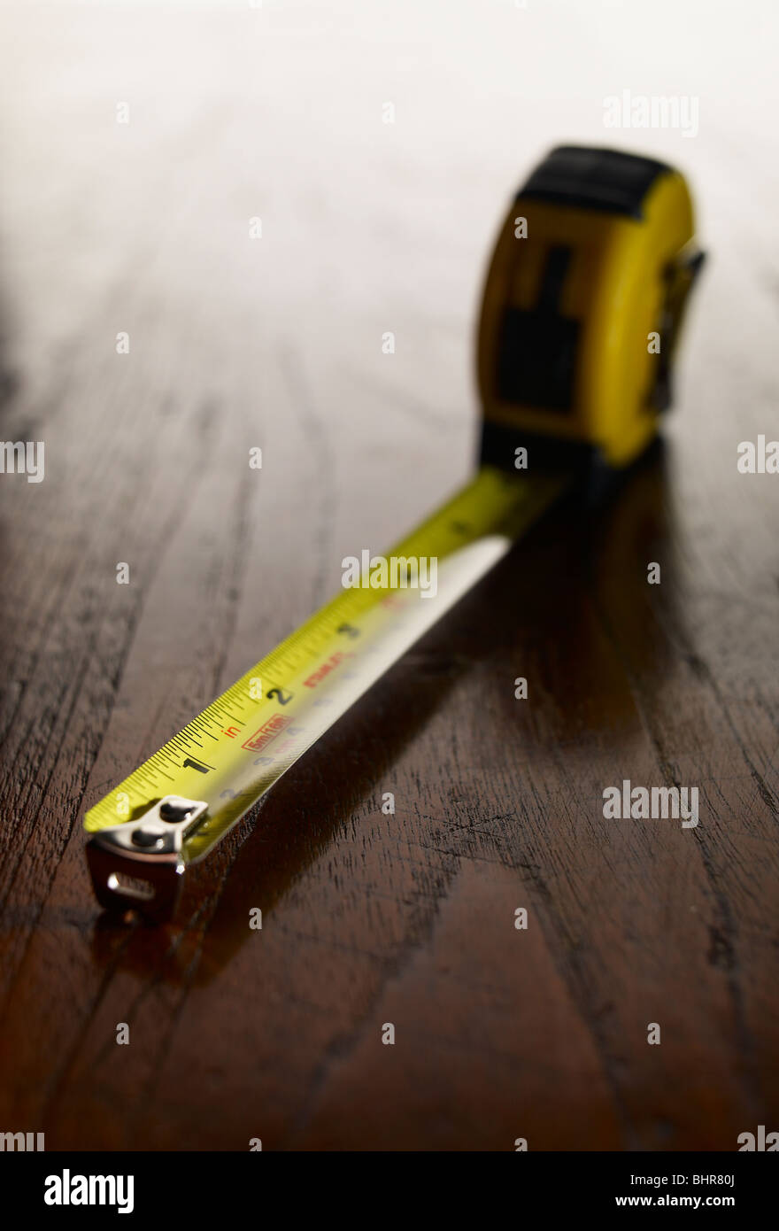 Yellow steel tape measure hi-res stock photography and images - Alamy