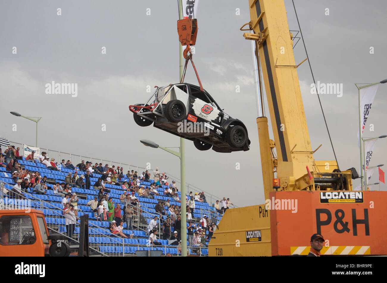 A car is lifted off the track at the Marrakech Grand Prix, Morocco ...