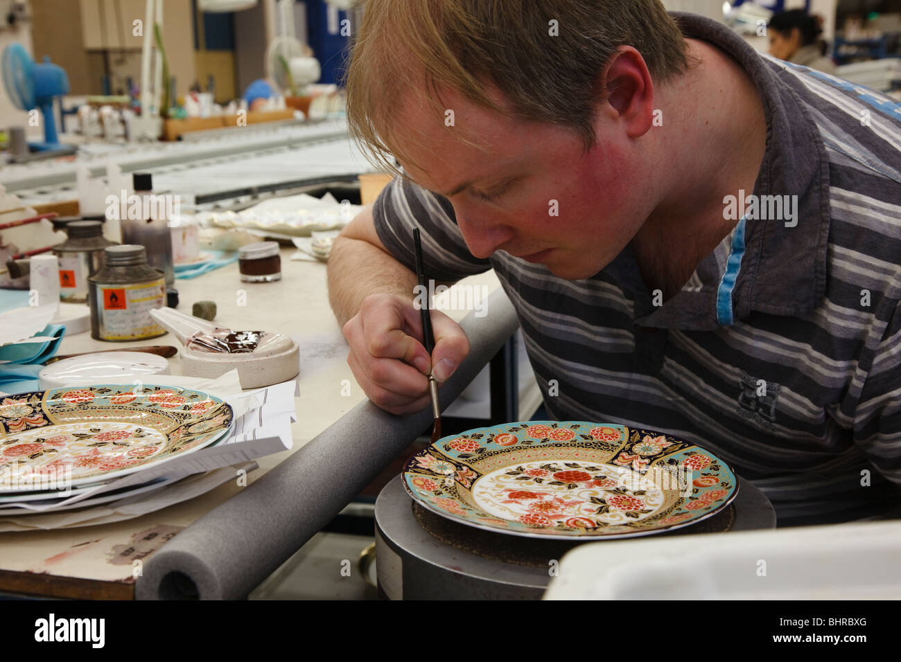 Royal Crown Derby factory, Derby - gilder Eddy Williamson Stock Photo ...