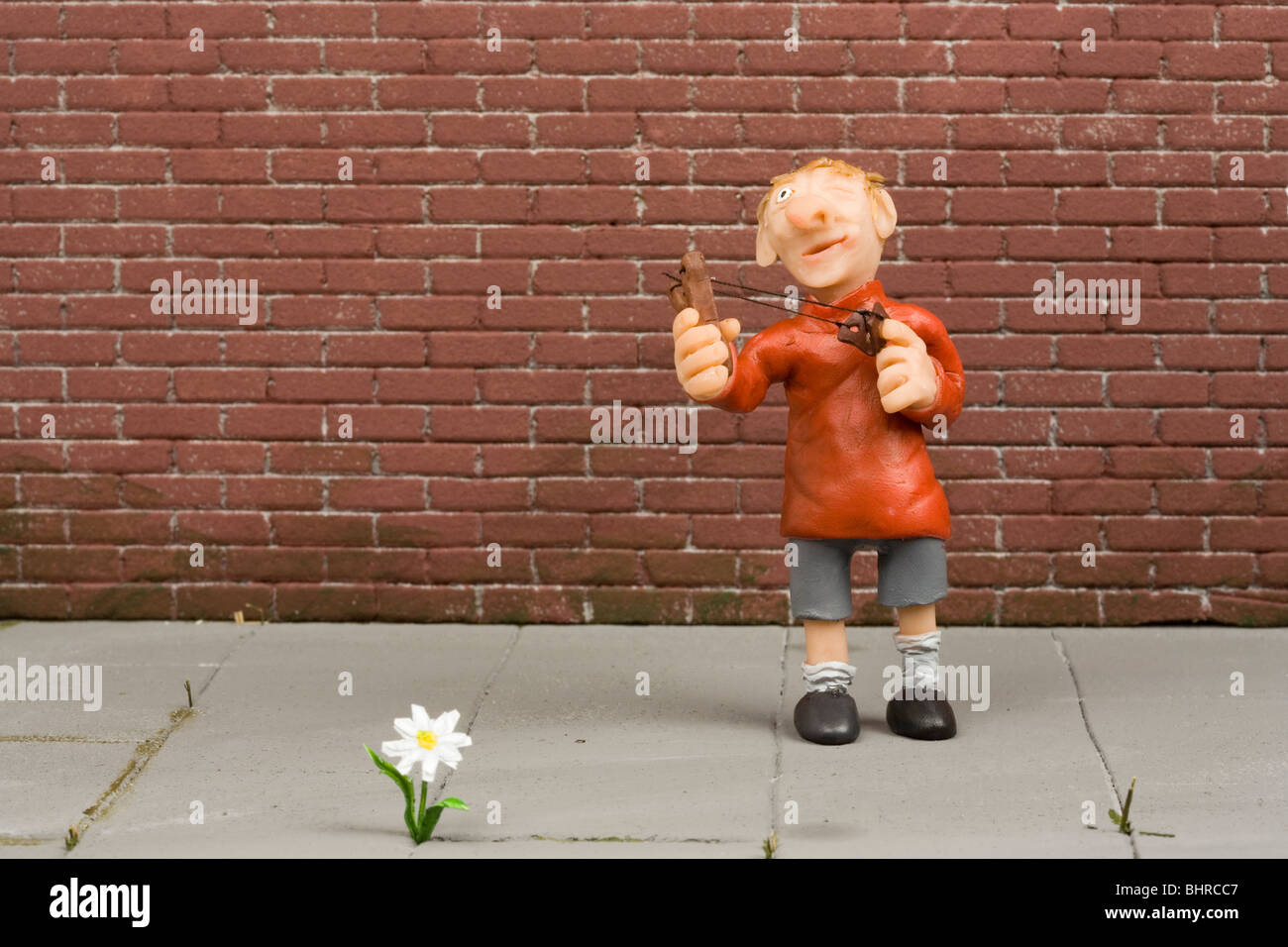 School boy using a catapult. All models are designed and made by the ...