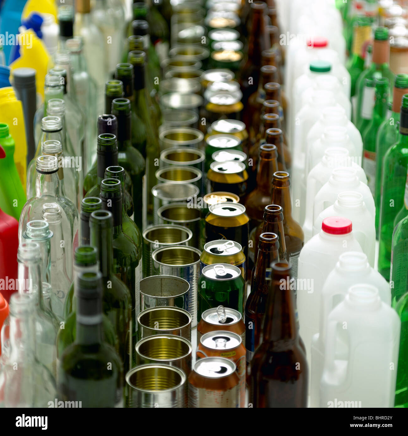 Bottles cans and tins lined up Stock Photo - Alamy