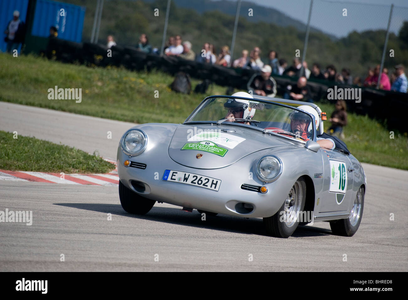 Silver 1958 Porsche 550 Spider racing in a rally in Spain Stock Photo ...