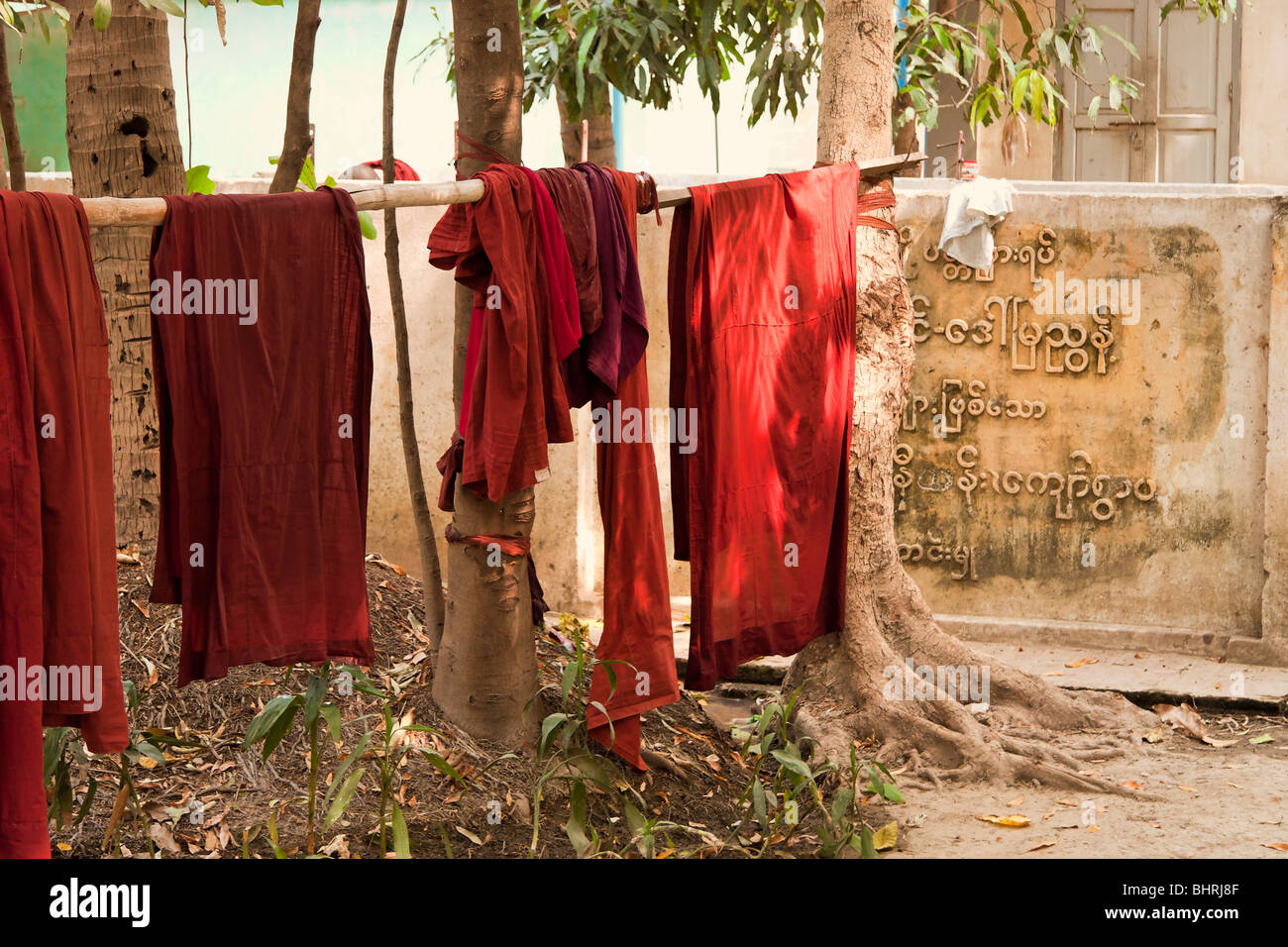 Monks robes at monastery yard in Myanmar Stock Photo - Alamy