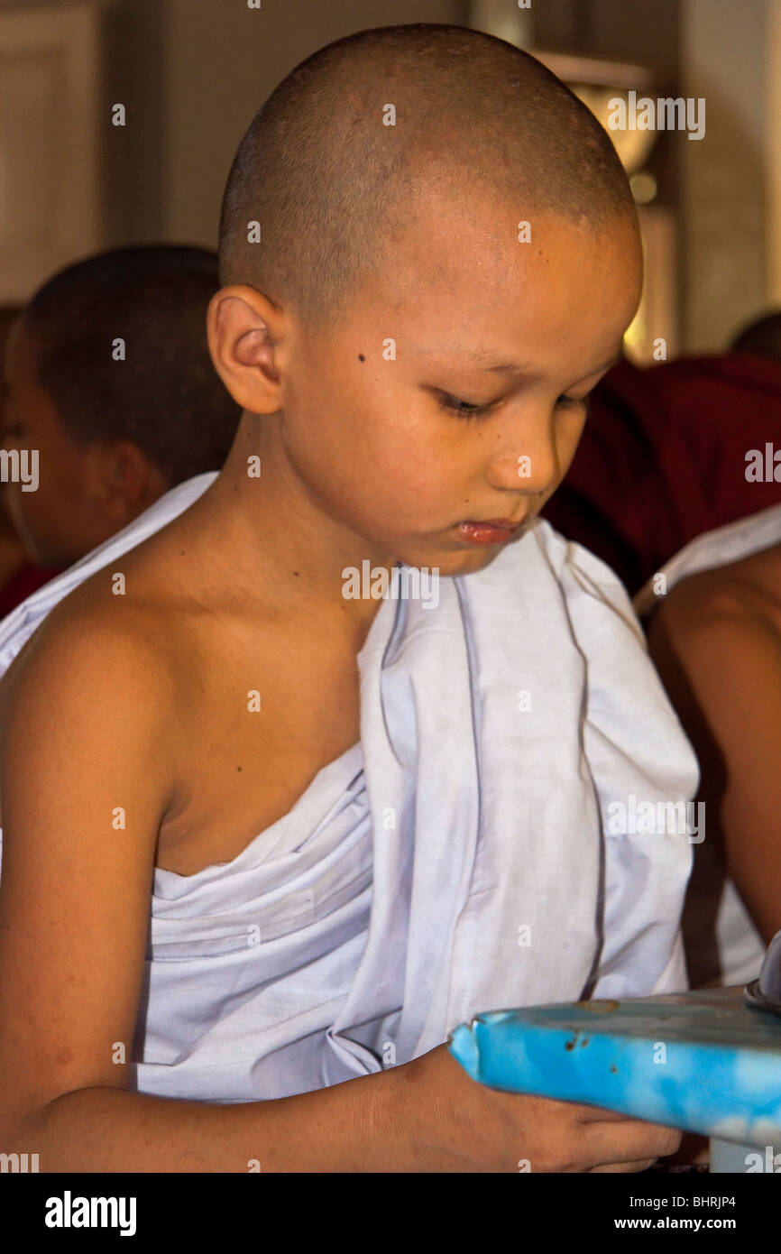 Young monk in white robe Stock Photo - Alamy