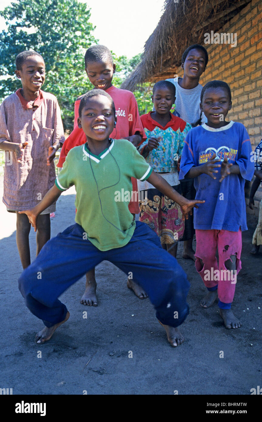 children dancing at a village near Kande, Lake Malawi, Malawi, Africa ...