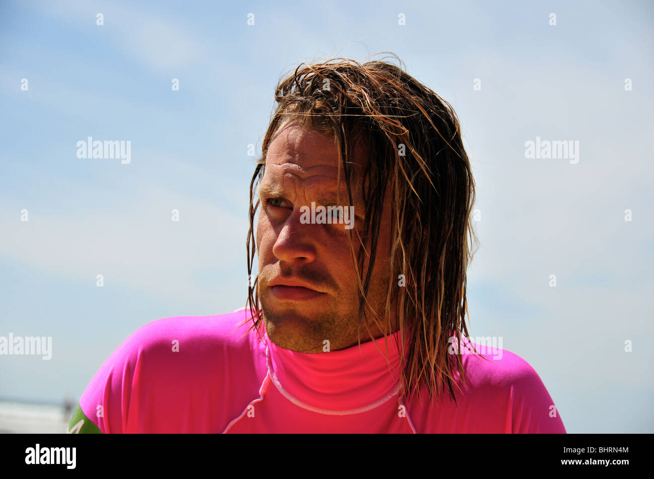 Pink wetsuit hi-res stock photography and images - Alamy