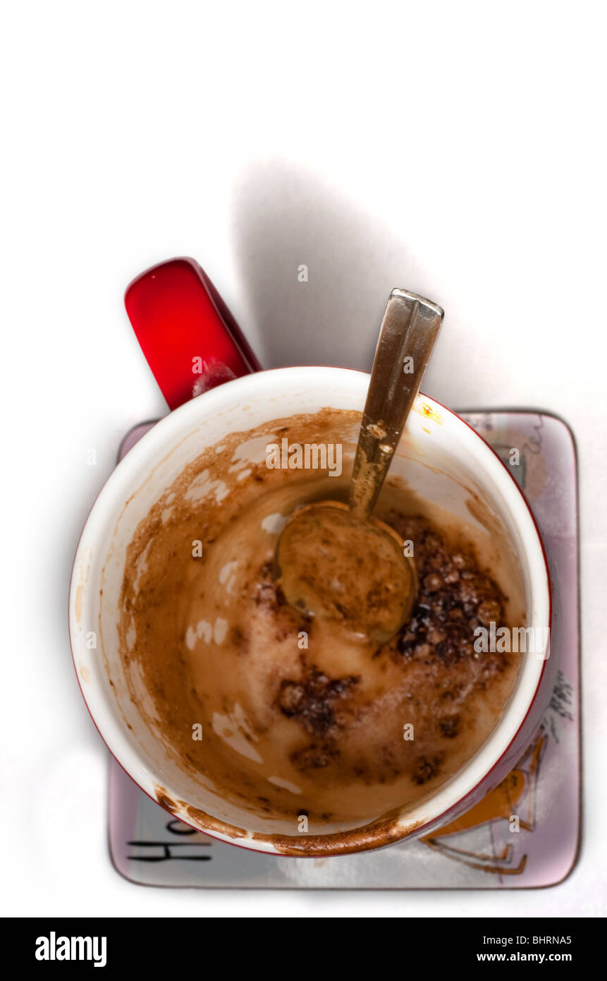 Half drunk mug of froffy coffee Stock Photo - Alamy
