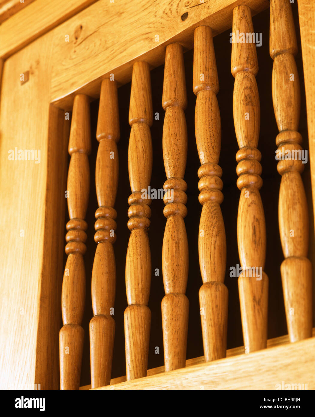 Close-up of cupboard door with an insert of turned spindles Stock Photo ...