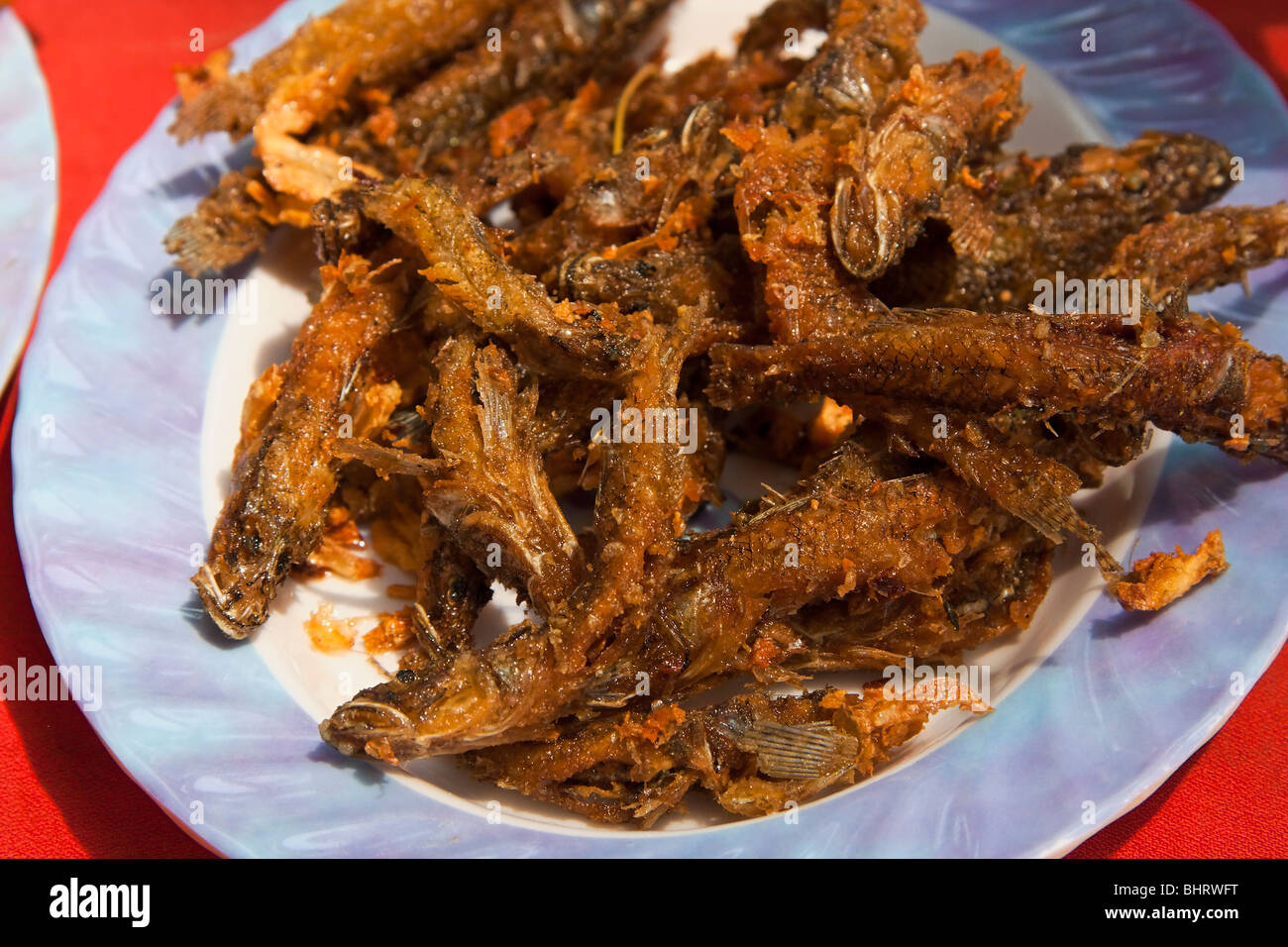 Fish on plate in Myanmar Stock Photo - Alamy
