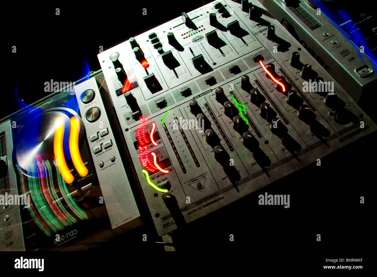 dj equipment long exposure with light being blured Stock Photo - Alamy
