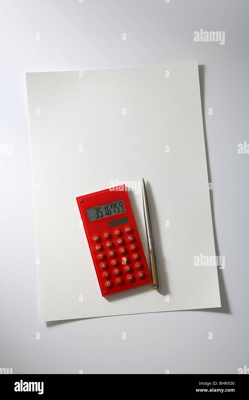 Calculator and Paper Stock Photo - Alamy