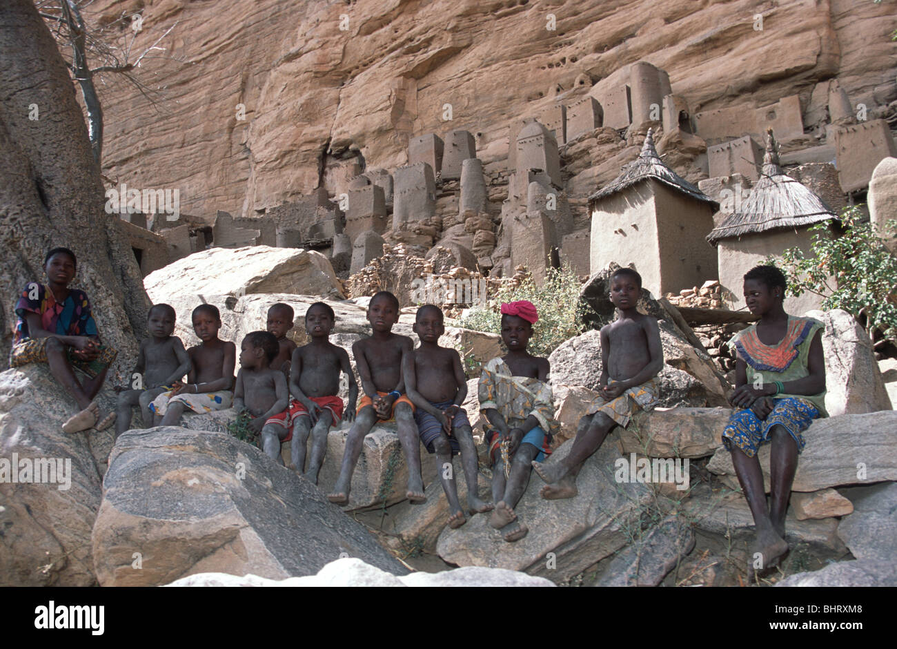 Children sitting in the shade hi-res stock photography and images - Alamy