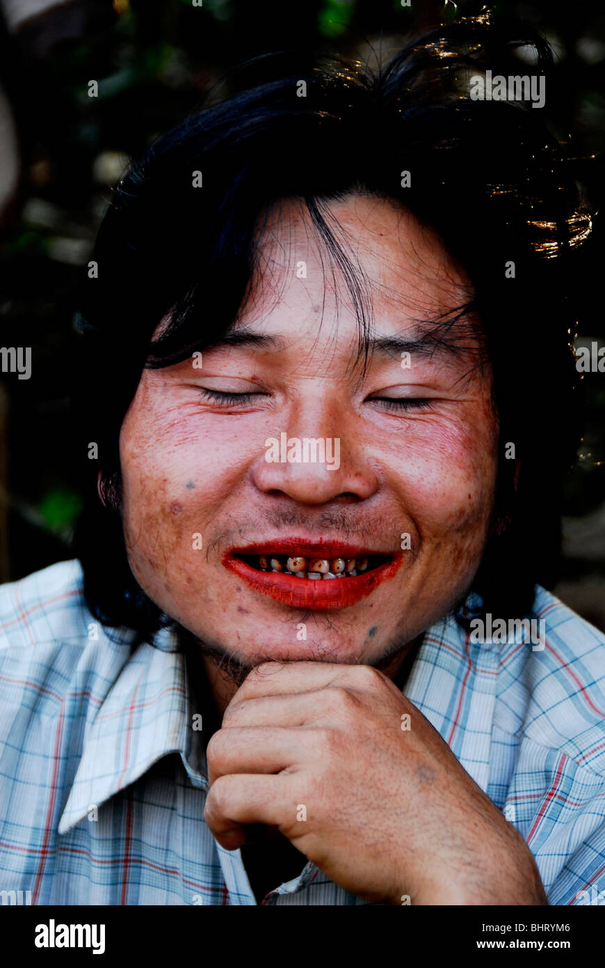 karen man chewing betal nut , mae la refugee camp(thai burmese border ...