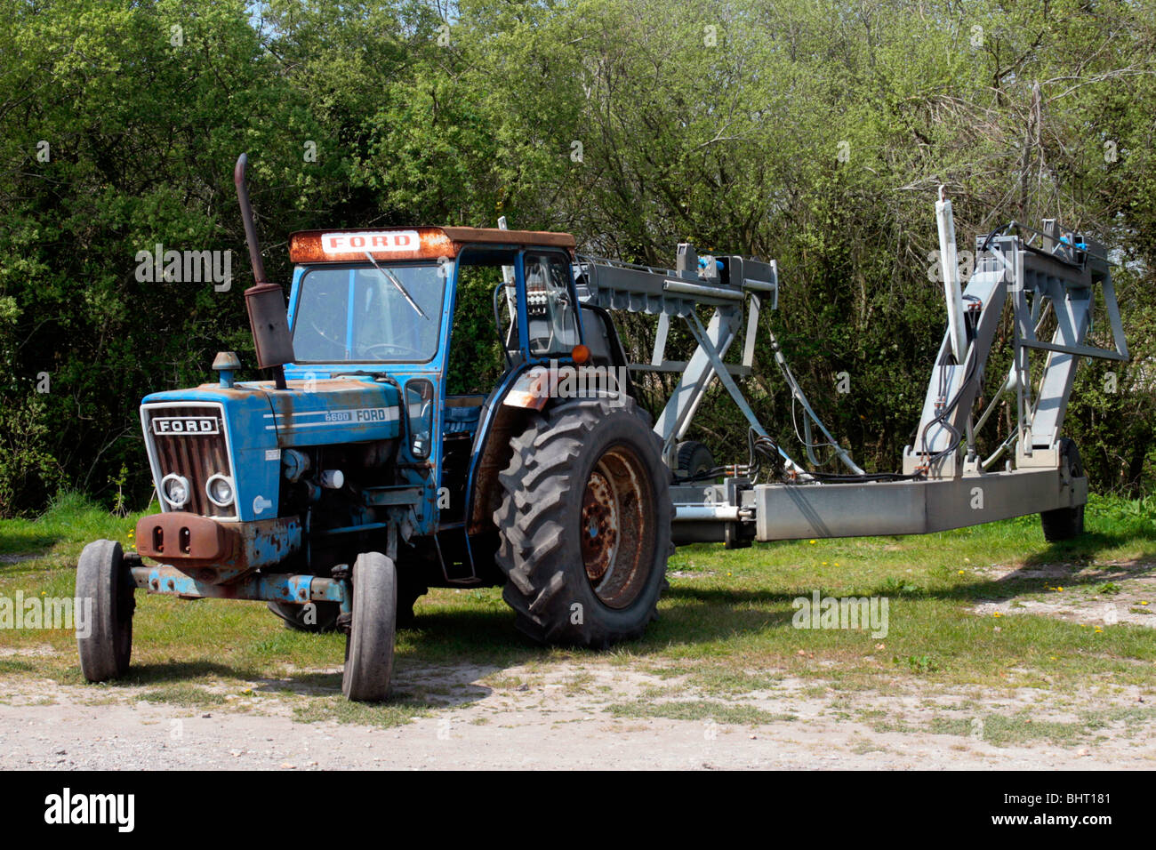 Old Ford tractor with special trailer for transporting yachts Stock ...