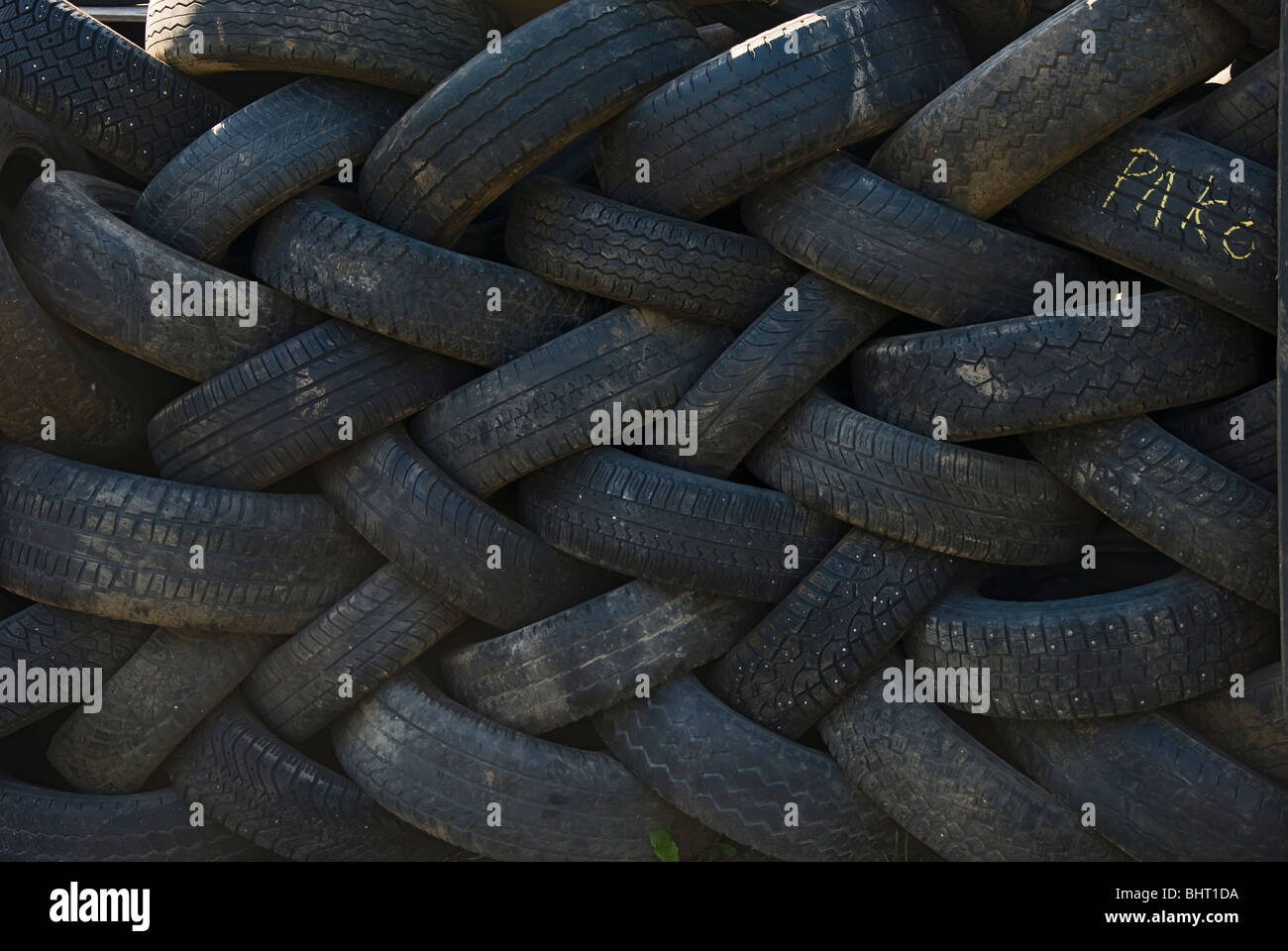Old used car tyres in a pile in Lahti Finland Stock Photo - Alamy