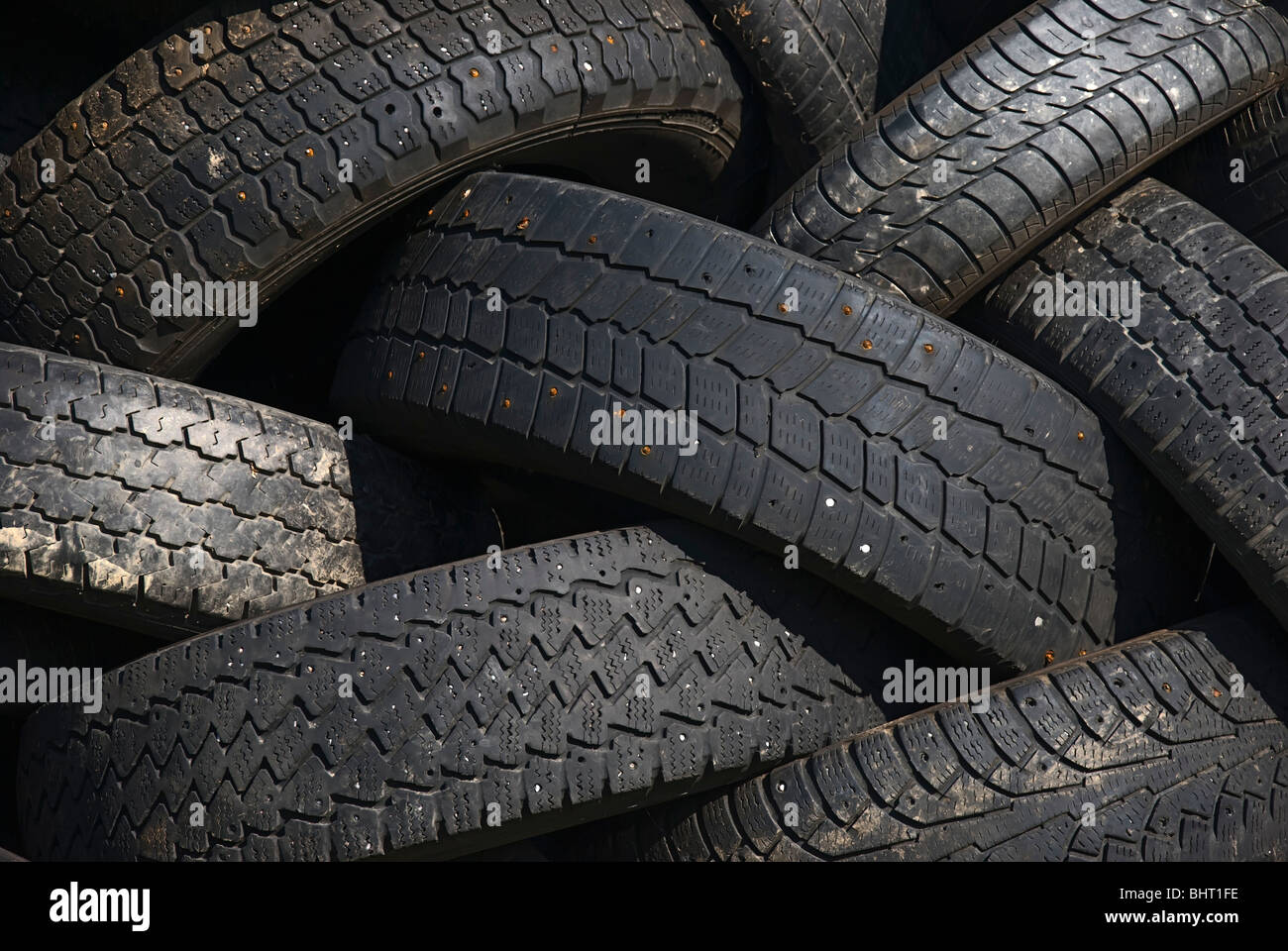 Old used car tyres in a pile in Lahti Finland Stock Photo - Alamy