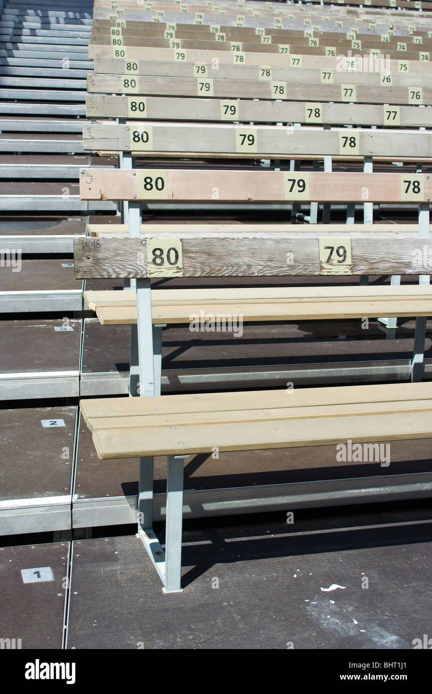 Rows of benches in an outdoor arena Stock Photo - Alamy