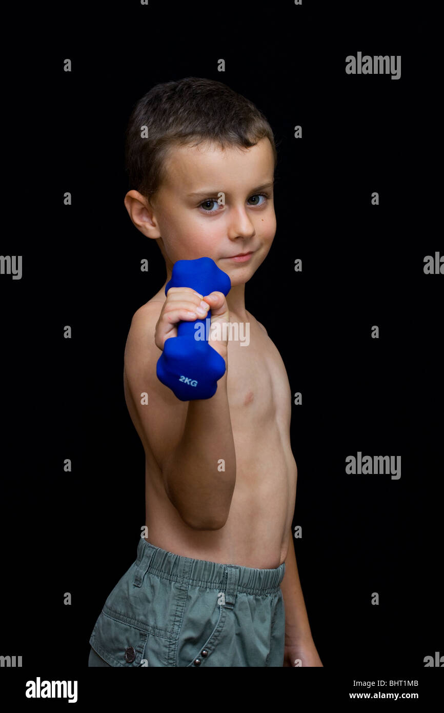 Low key portrait cute boy hi-res stock photography and images - Alamy
