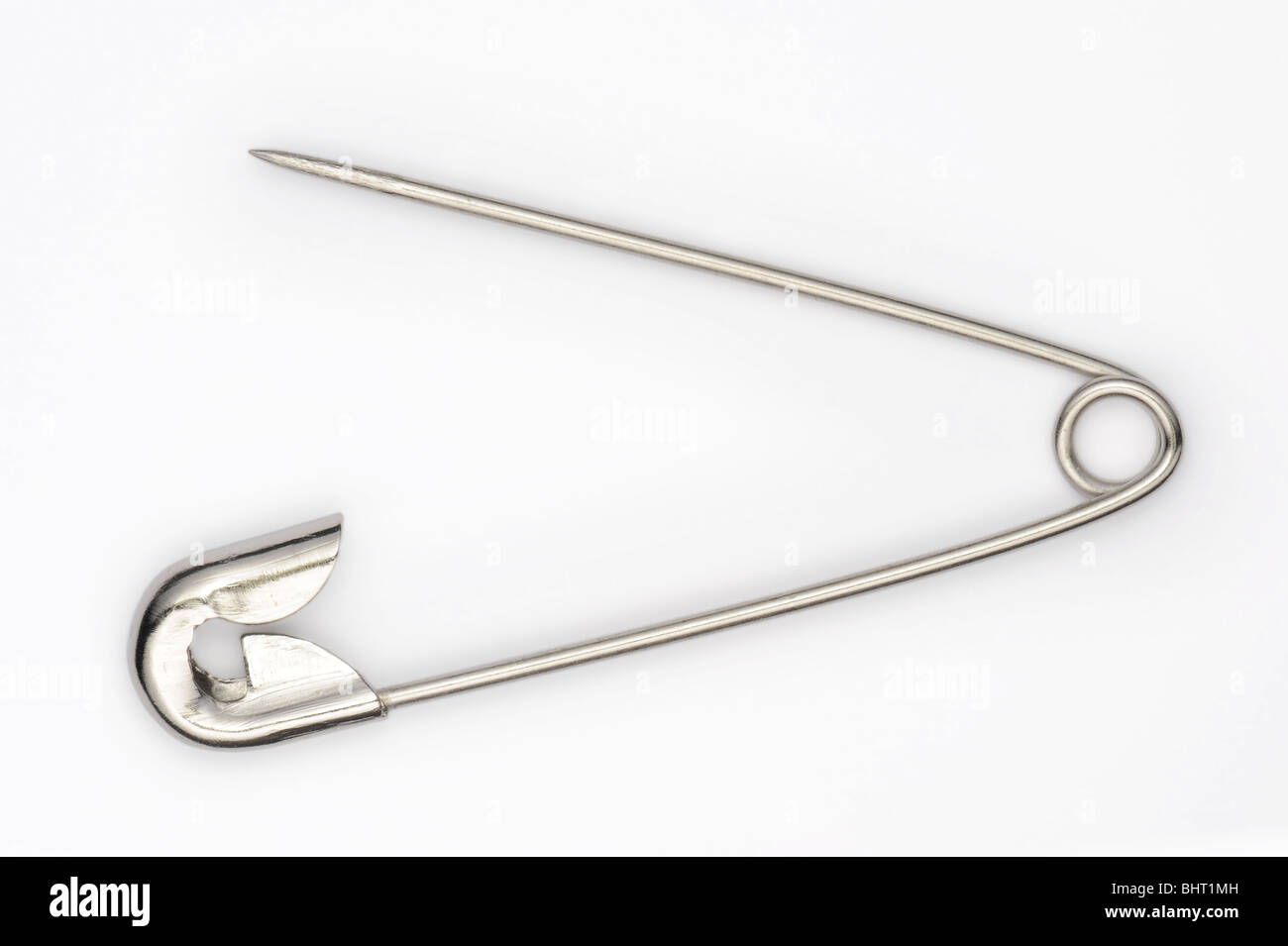 A silver safety pin Stock Photo - Alamy