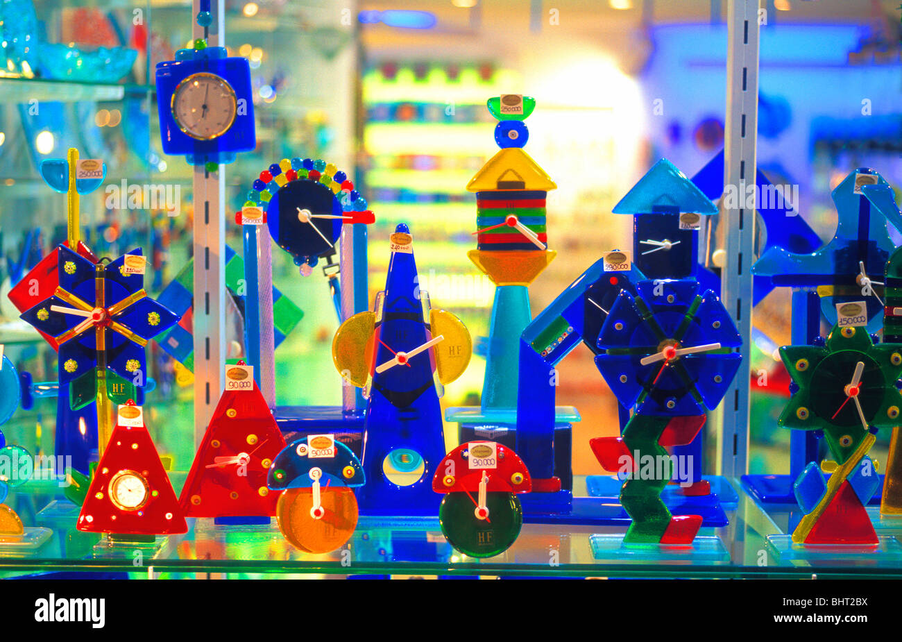Display of colorful Murano glass clocks in shop window, Venice, Italy Stock Photo - Alamy