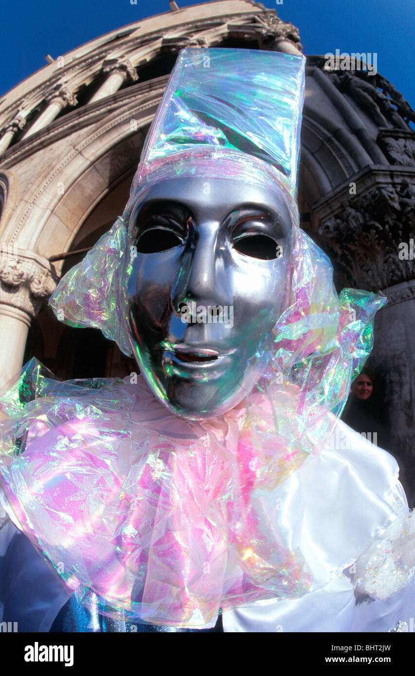 Metallic mask & coloured cellophane head gear at the Venice Carnival ...
