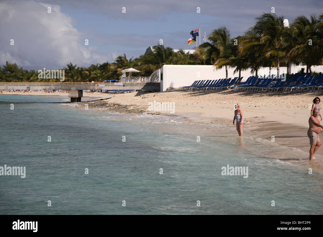 Turk and Caicos Islands, beach scene with palm trees and bathers Stock ...