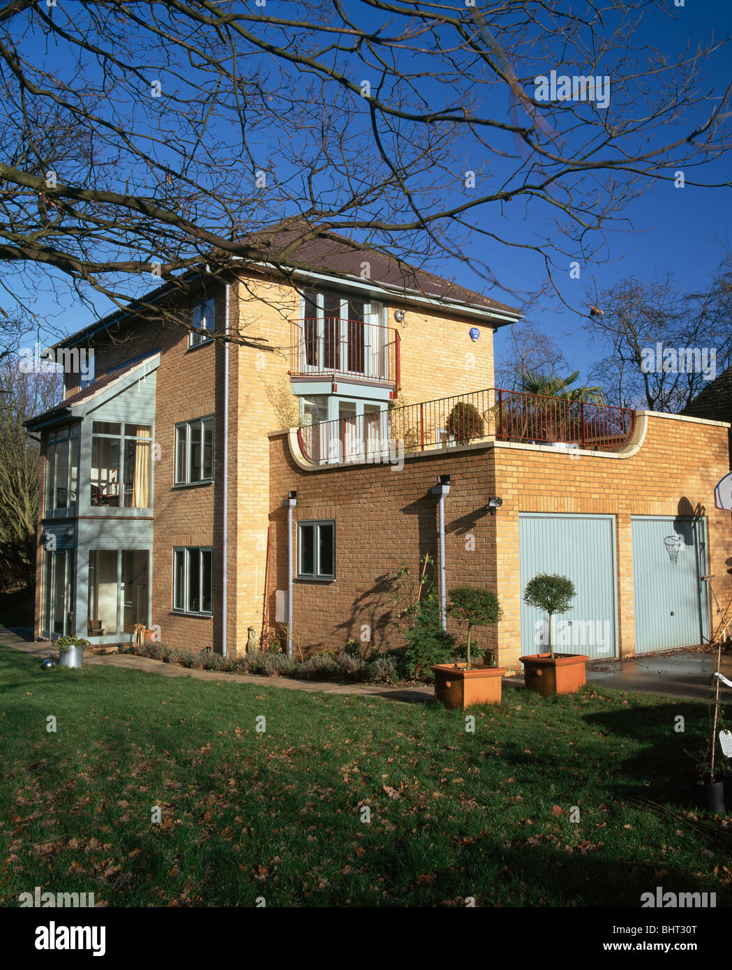 Modern new-build country house with roof terrace above double garage ...