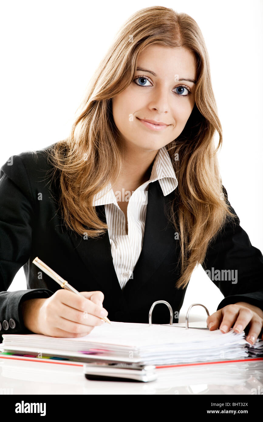 Portrait of a beautiful business woman in the office doing some ...