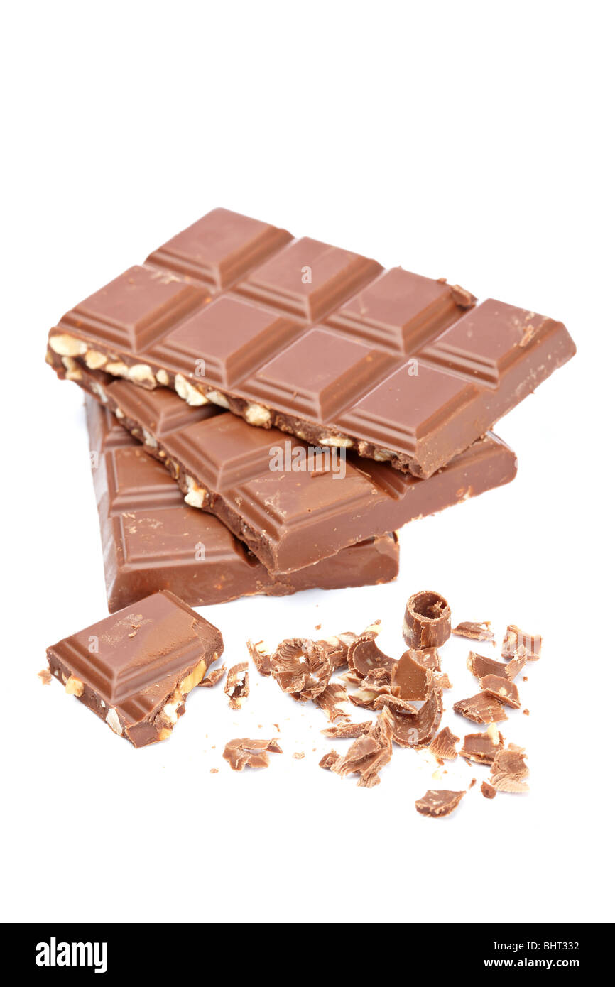 Blocks of chocolate isolated on white background. Shallow depth of ...