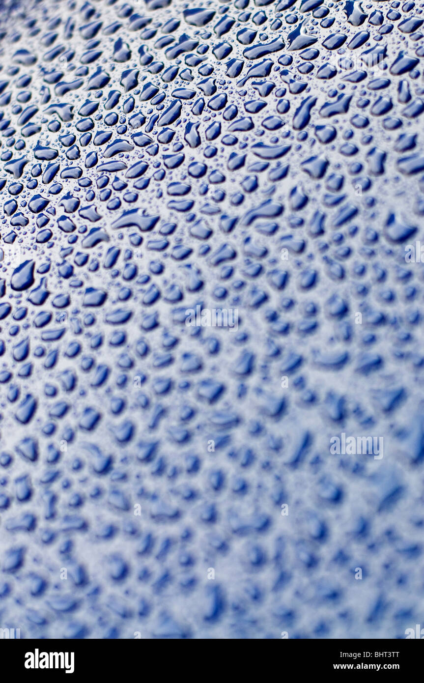 Rain drops on a metallic surface Stock Photo - Alamy