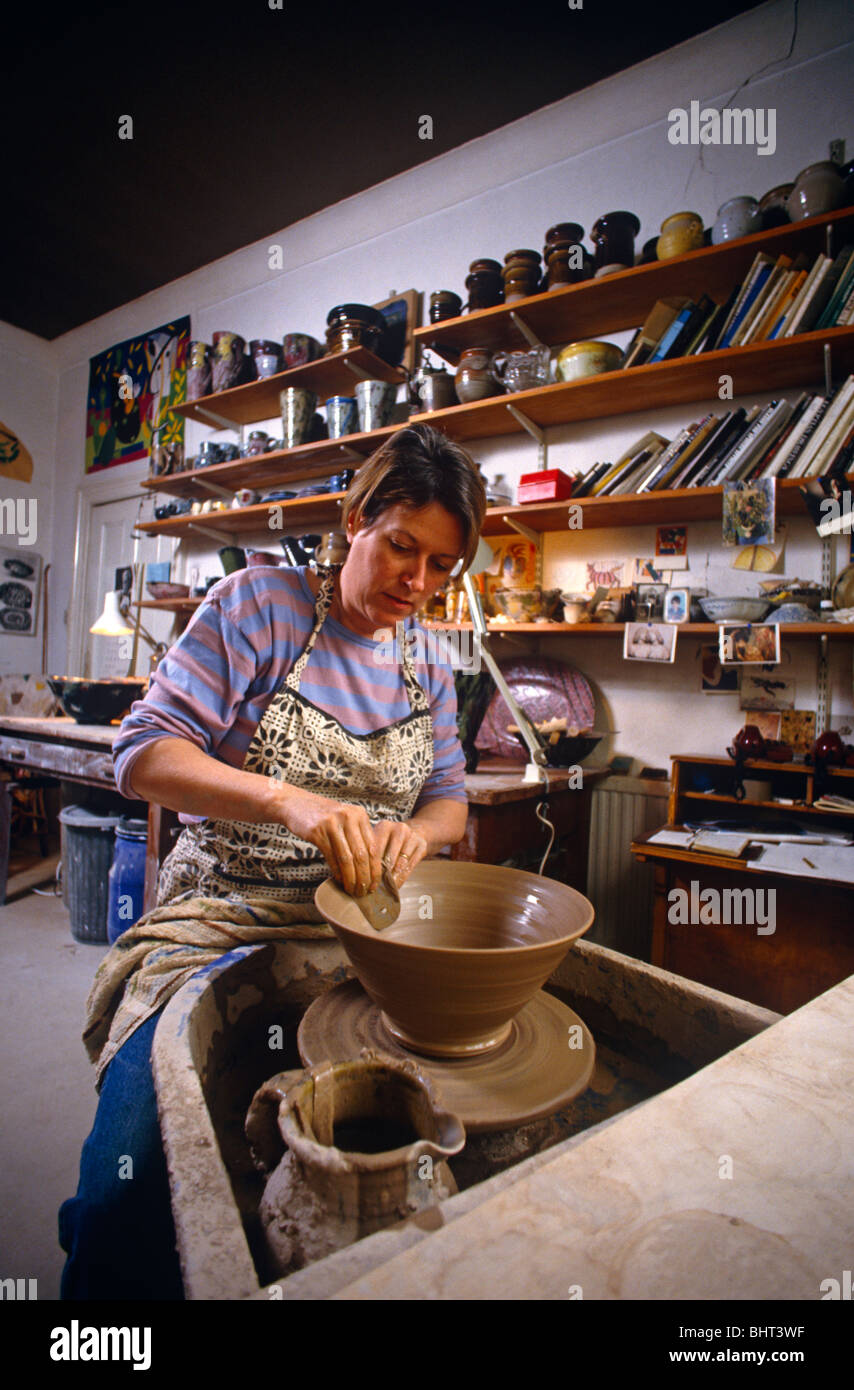 The potter/artist Janice Tchalenko throws a pot in her home studio in ...