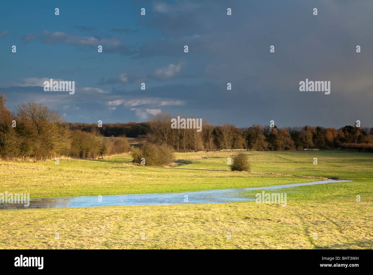 The River Thames as it winds through fields just downstream from the ...