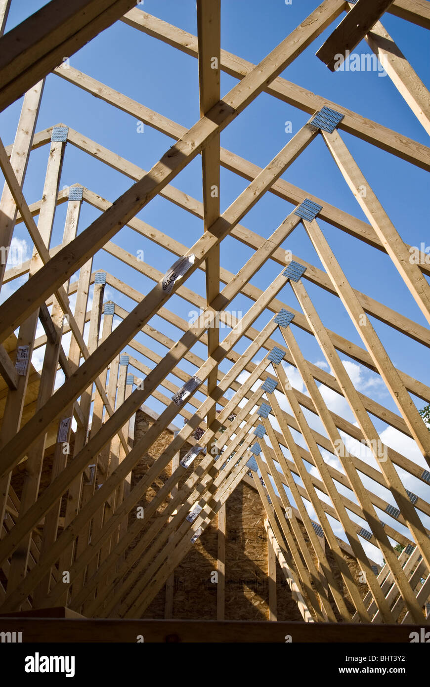 New residential construction home framing against a deep blue sky Stock ...
