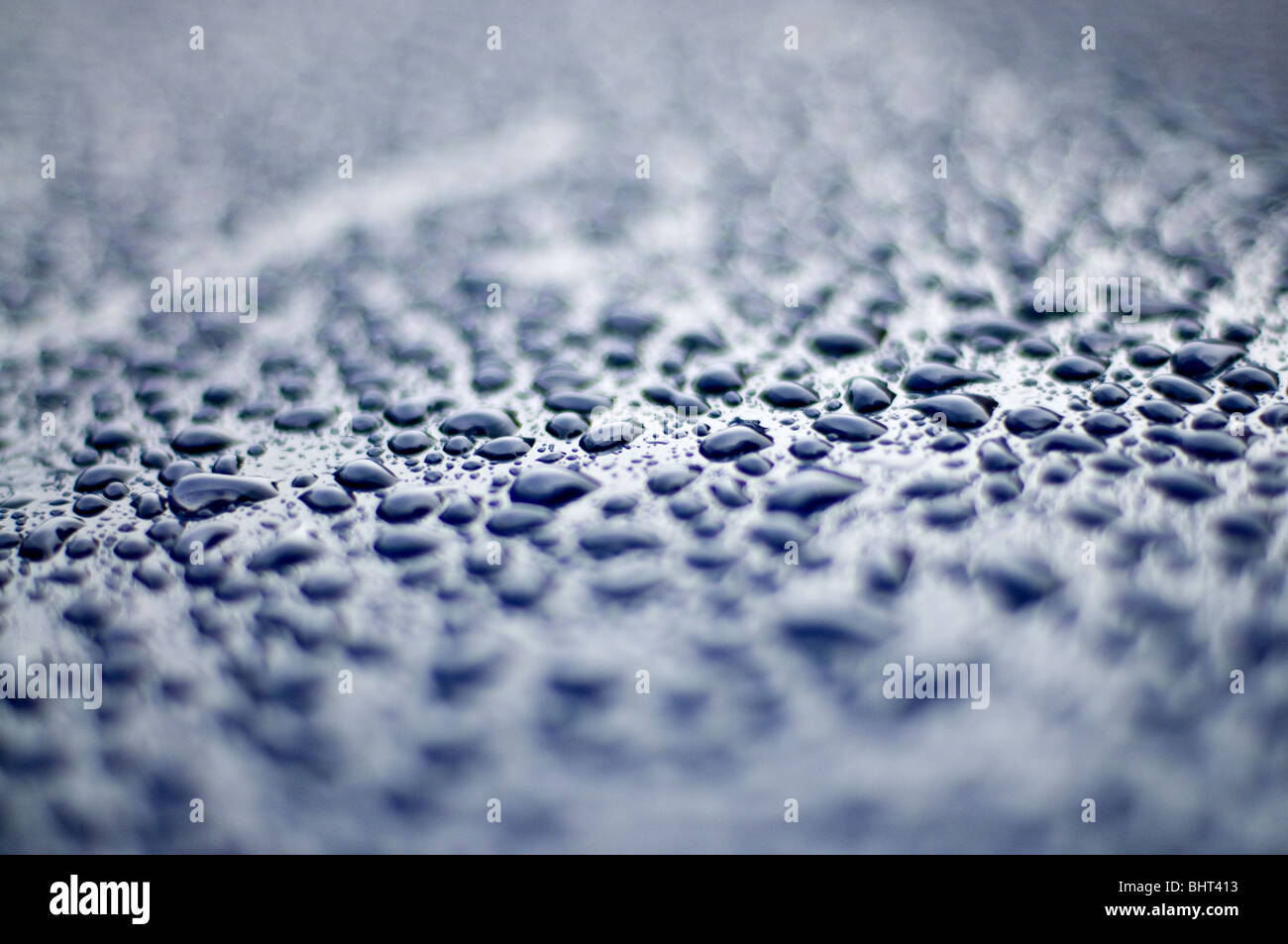 Water drops hitting wet surface hi-res stock photography and images - Alamy