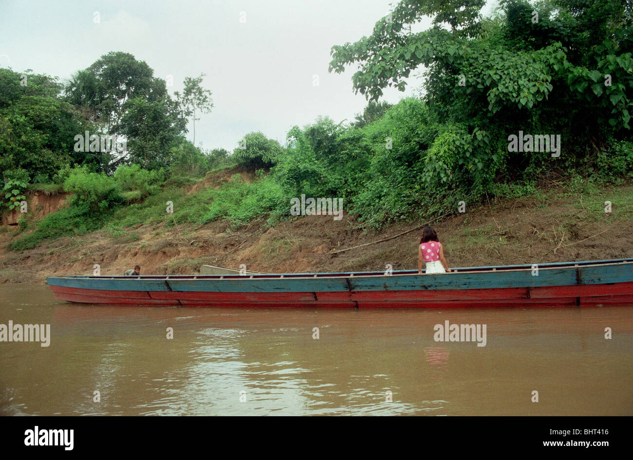 Girl in canoe on the Peruvian Amazon River Stock Photo - Alamy