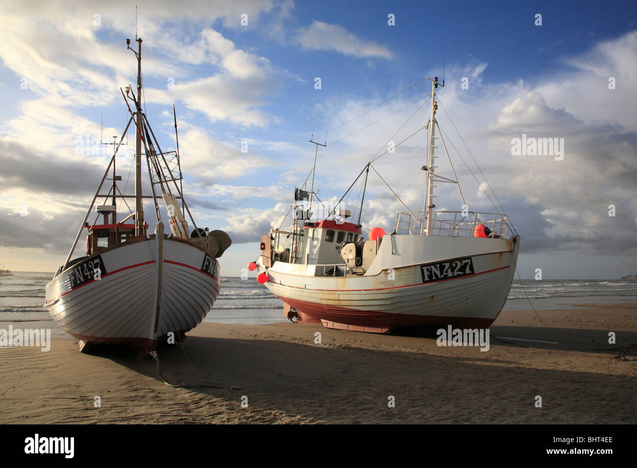 Two blue fishing boats hi-res stock photography and images - Alamy