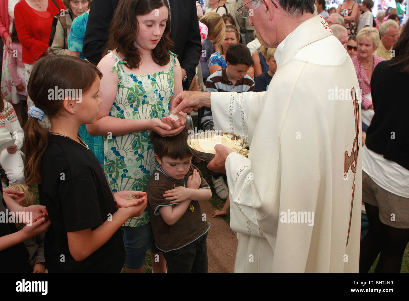 Catholic communion priest hi-res stock photography and images - Alamy