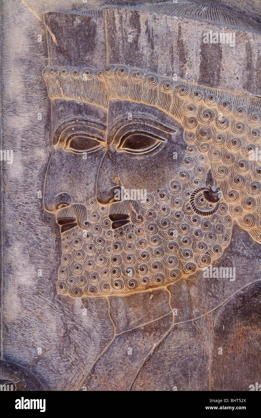 Relief sculpture of bearded men (palace guards) at Apadana Palace ...